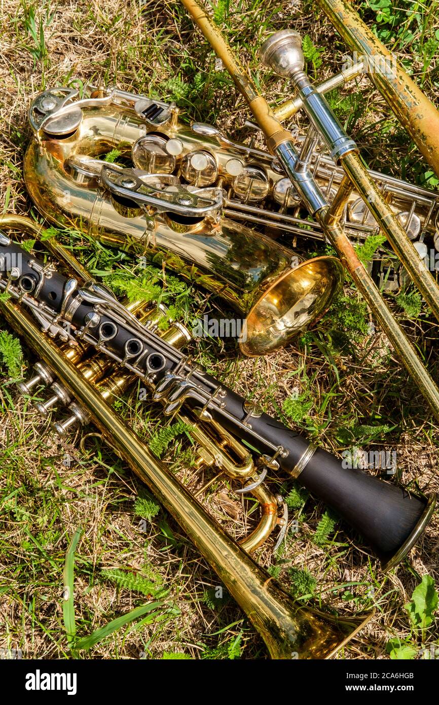Musical instruments including trombone trumpet clarinet and saxophone ...