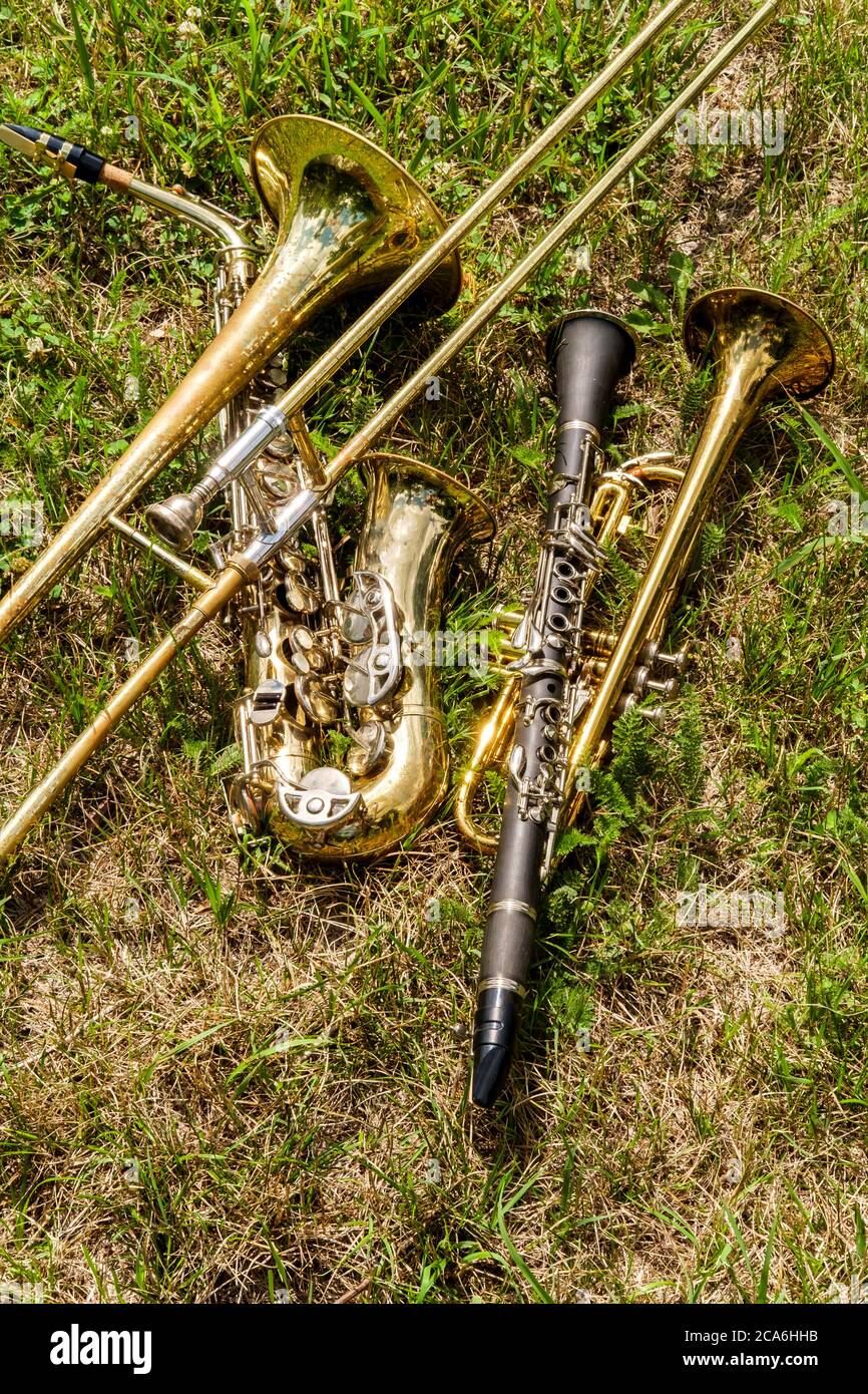 Musical instruments including trombone trumpet clarinet and saxophone ...