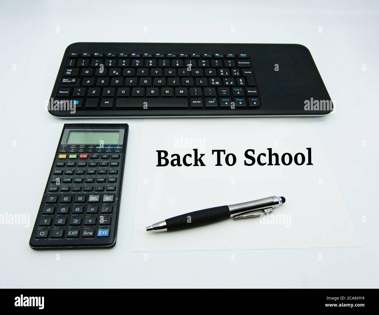 Computer keyboard, calculator, pen, isolated on white background. Back ...