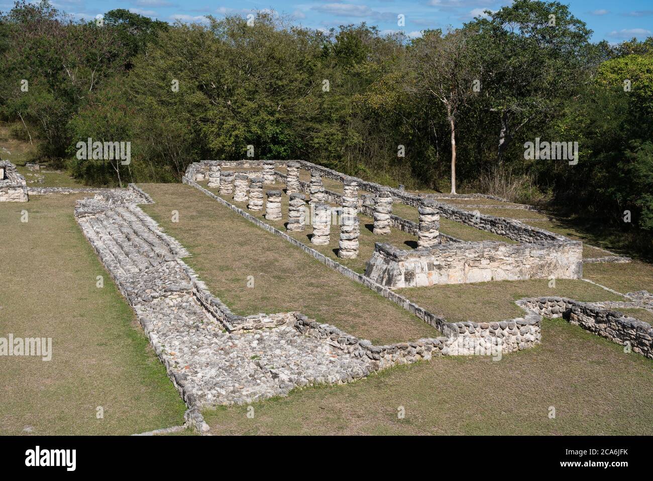 Colonnades in the ruins of the Post-Classic Mayan city of Mayapan ...