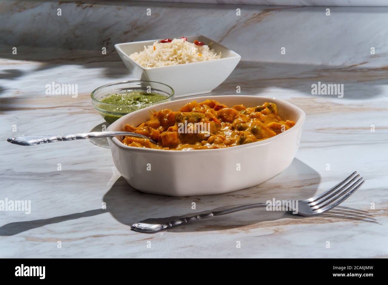 Authentic Indian vegetable korma curry dinner with green chutney and ...