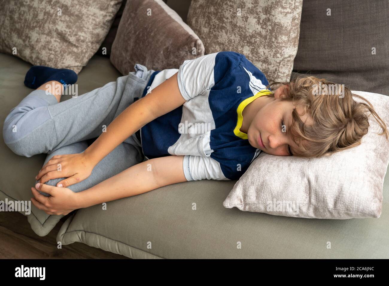 Growth pain in children, boy, 10 years old, has pain in the leg ...