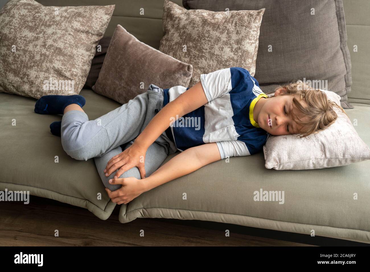Growth pain in children, boy, 10 years old, has pain in the leg ...