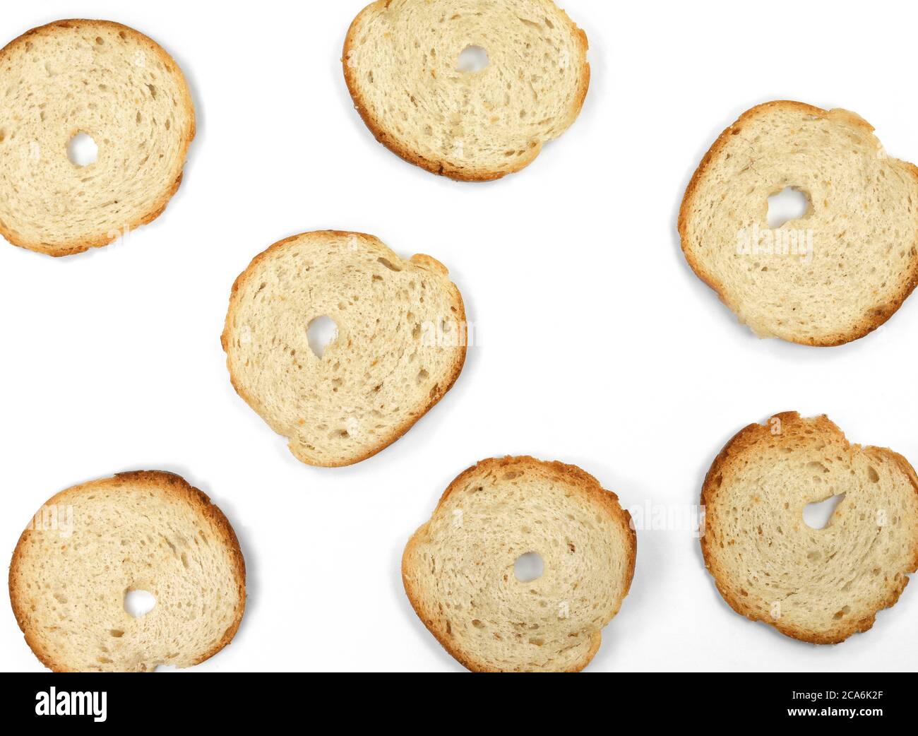 Bake rolls. Mini bread chips isolated on white background. Round bread ...