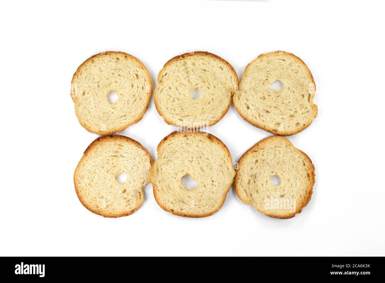 Bake rolls. Mini bread chips isolated on white background. Round bread ...
