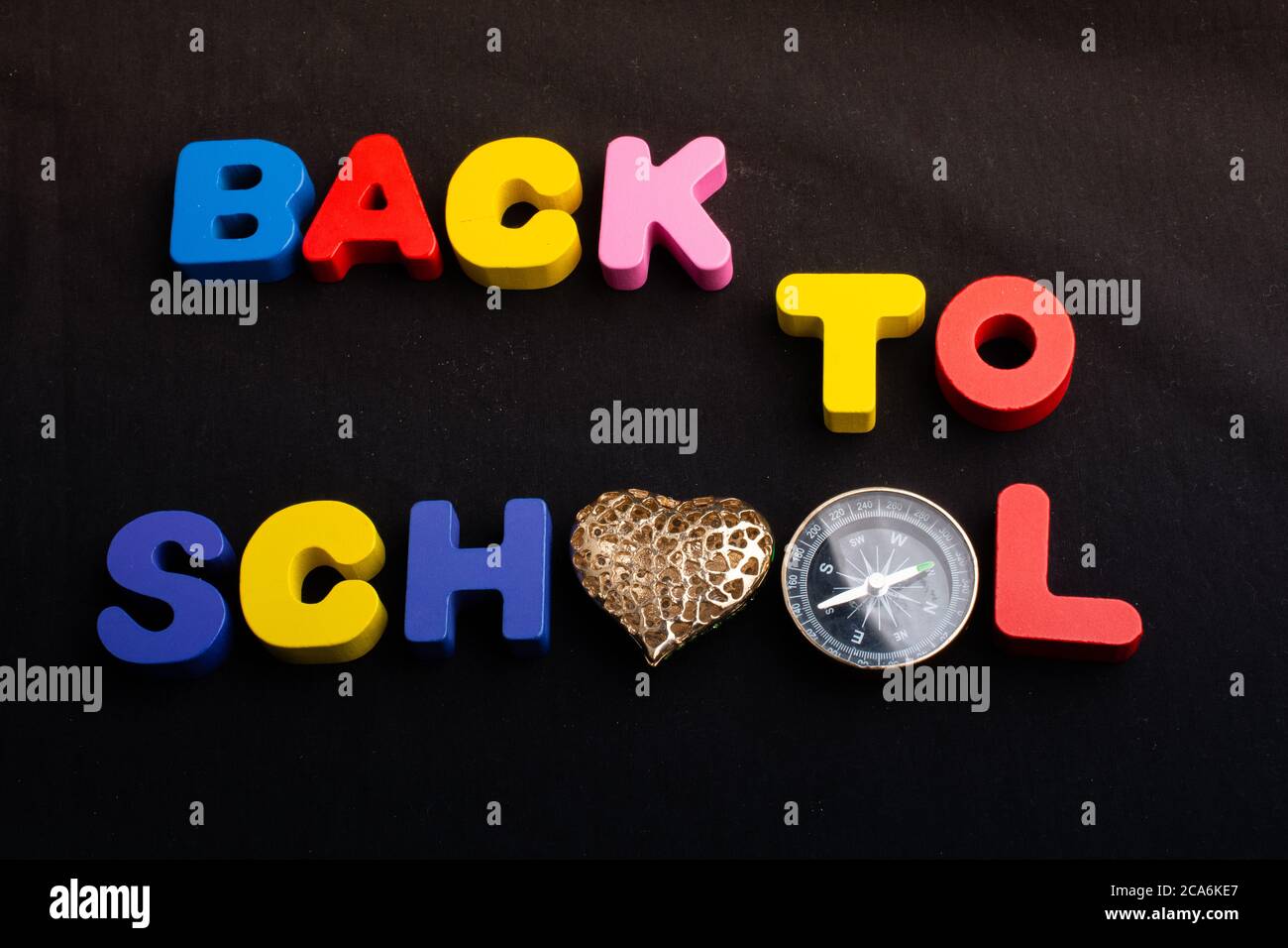 Education concept by School lettering with colorful wooden letters ...