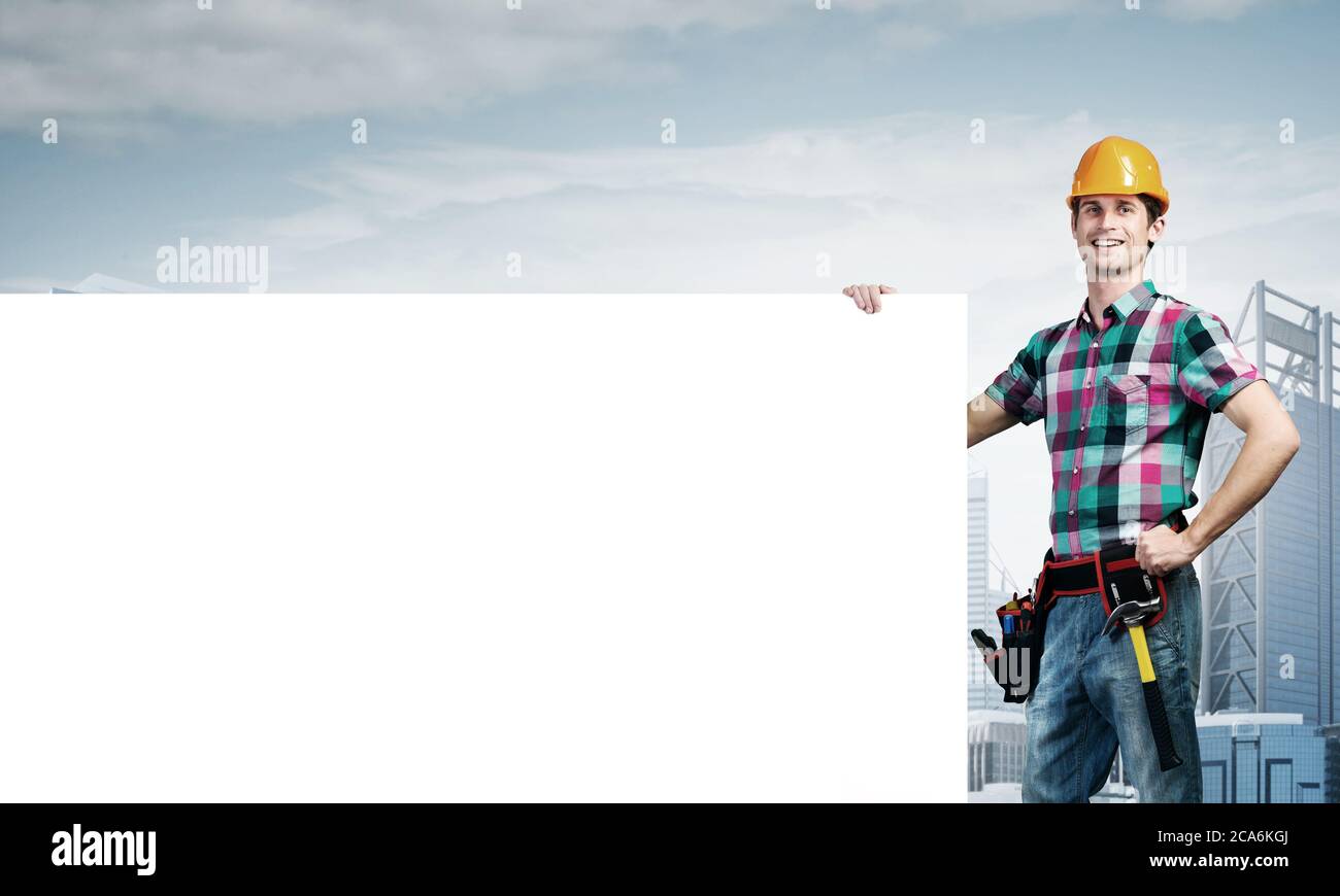 Repairman demonstrating banner Stock Photo - Alamy