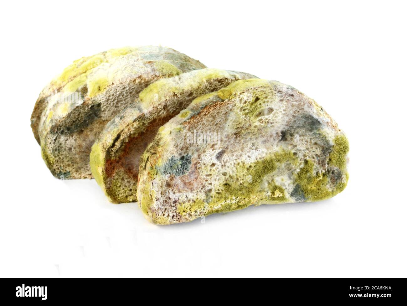 Moldy bread, isolated on white background Stock Photo - Alamy