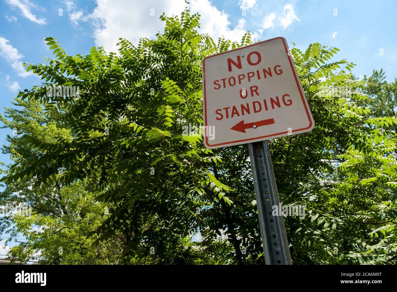 No stopping or standing road sign with beautiful landscape background ...