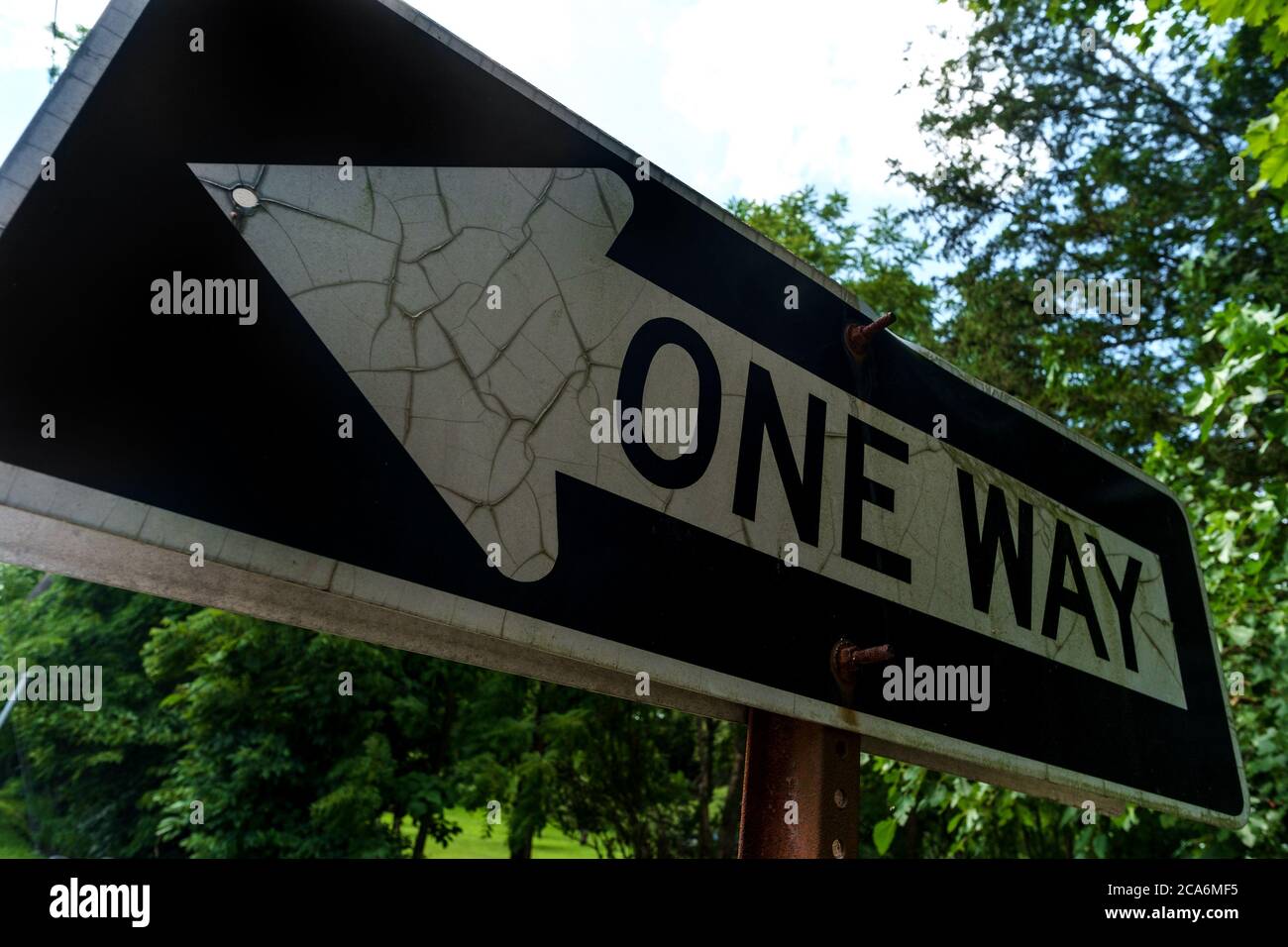 Closeup one way arrow sign indicating the direction of traffic Stock ...