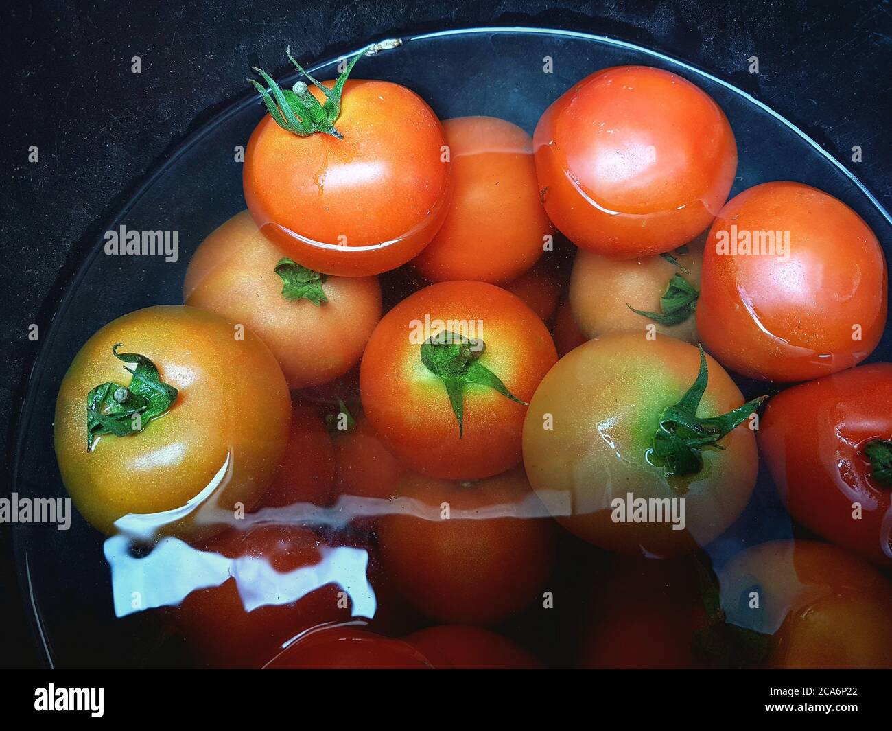 Fresh tomatoes water splash hi-res stock photography and images - Alamy