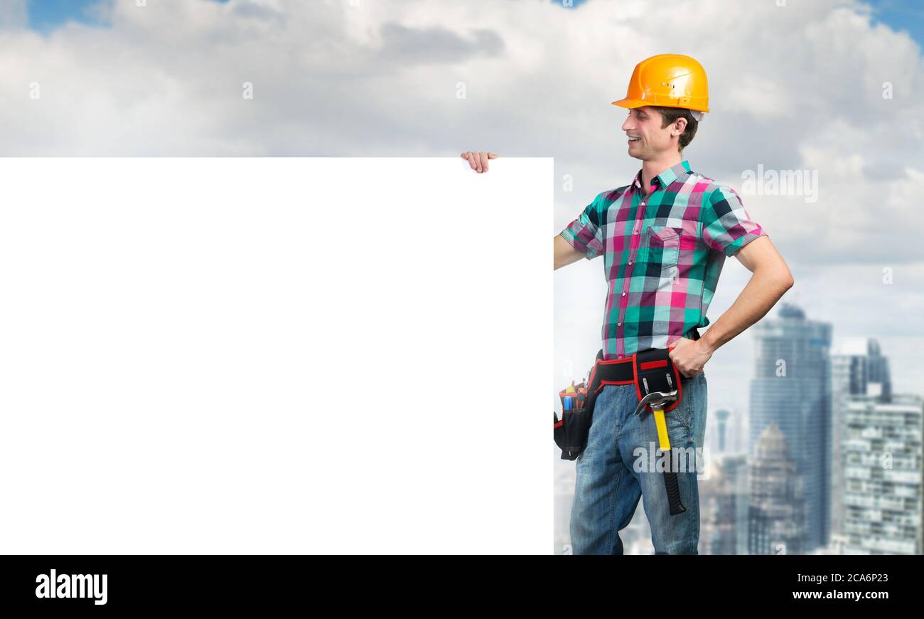 Repairman demonstrating banner Stock Photo - Alamy