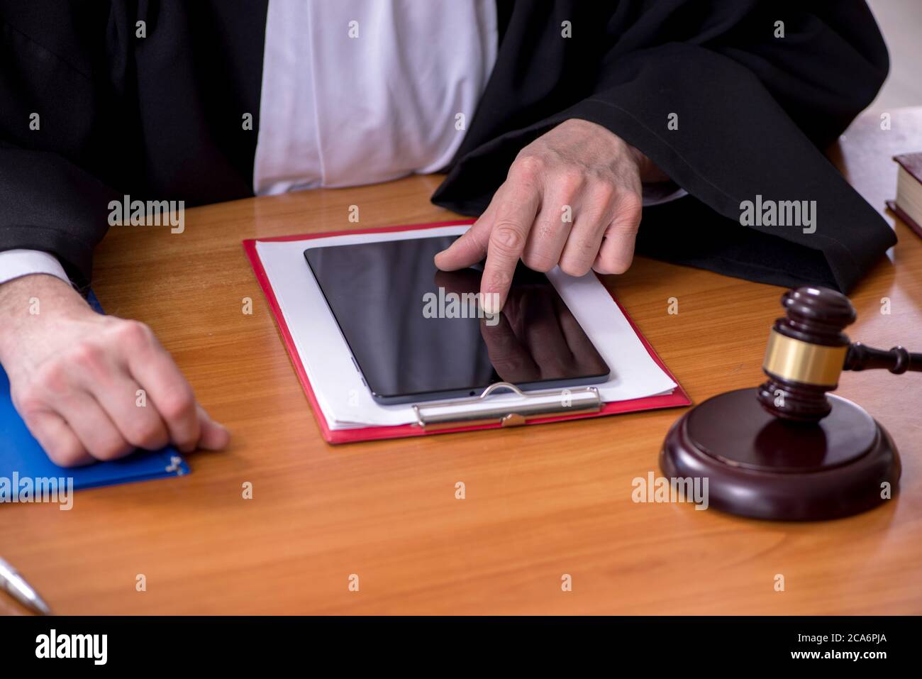 Old judge working in courthouse Stock Photo - Alamy
