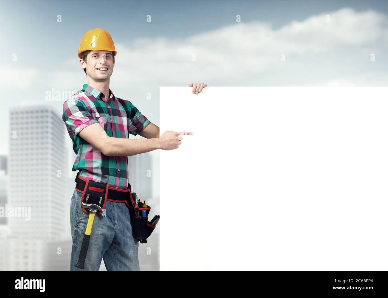 Repairman demonstrating banner Stock Photo - Alamy
