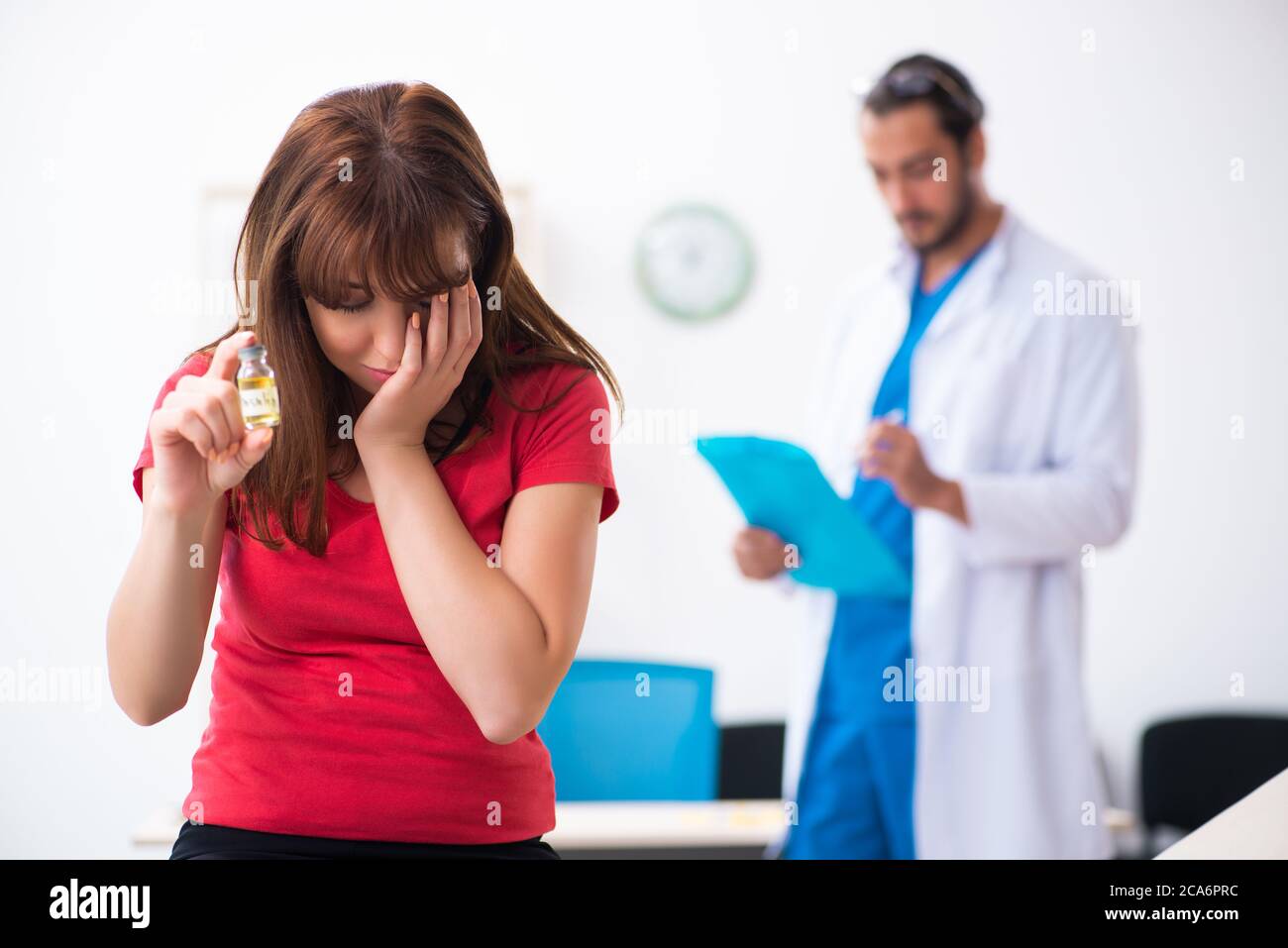 Female diabetic patient visiting young doctor Stock Photo - Alamy