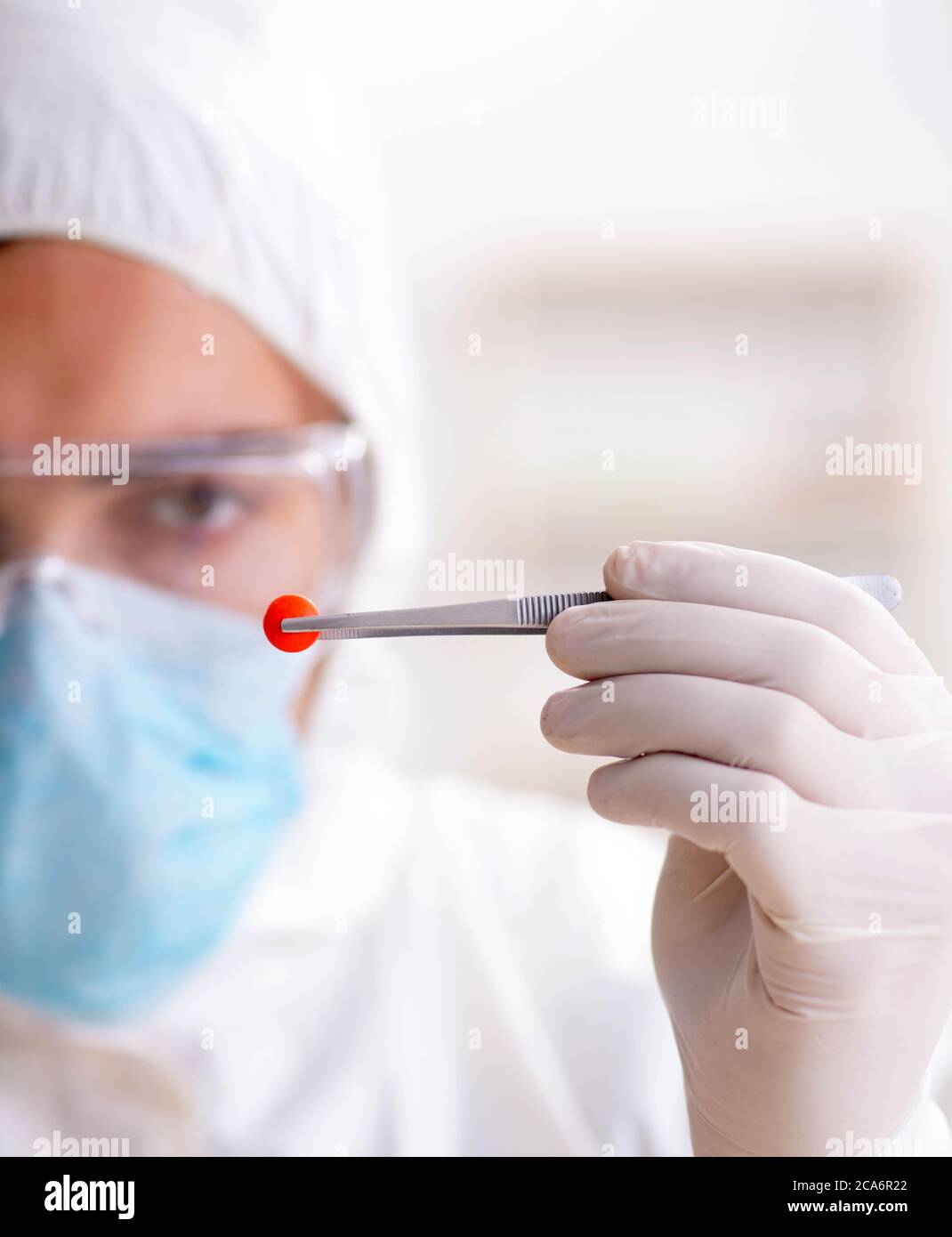 The lab assistant in drug synthesis concept Stock Photo - Alamy