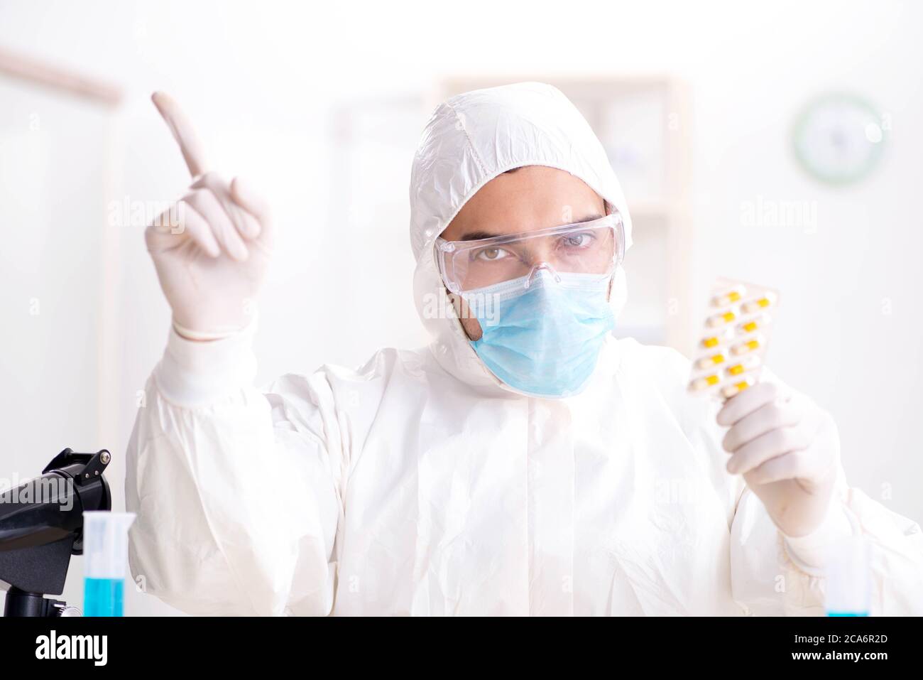 The lab assistant in drug synthesis concept Stock Photo - Alamy
