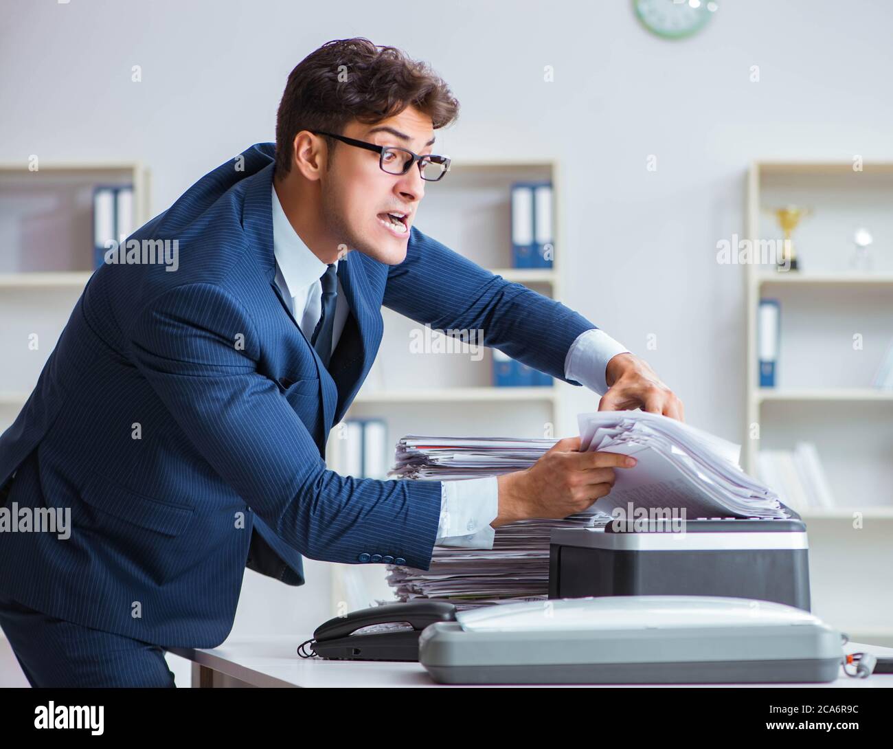 The businessman making copies in copying machine Stock Photo - Alamy