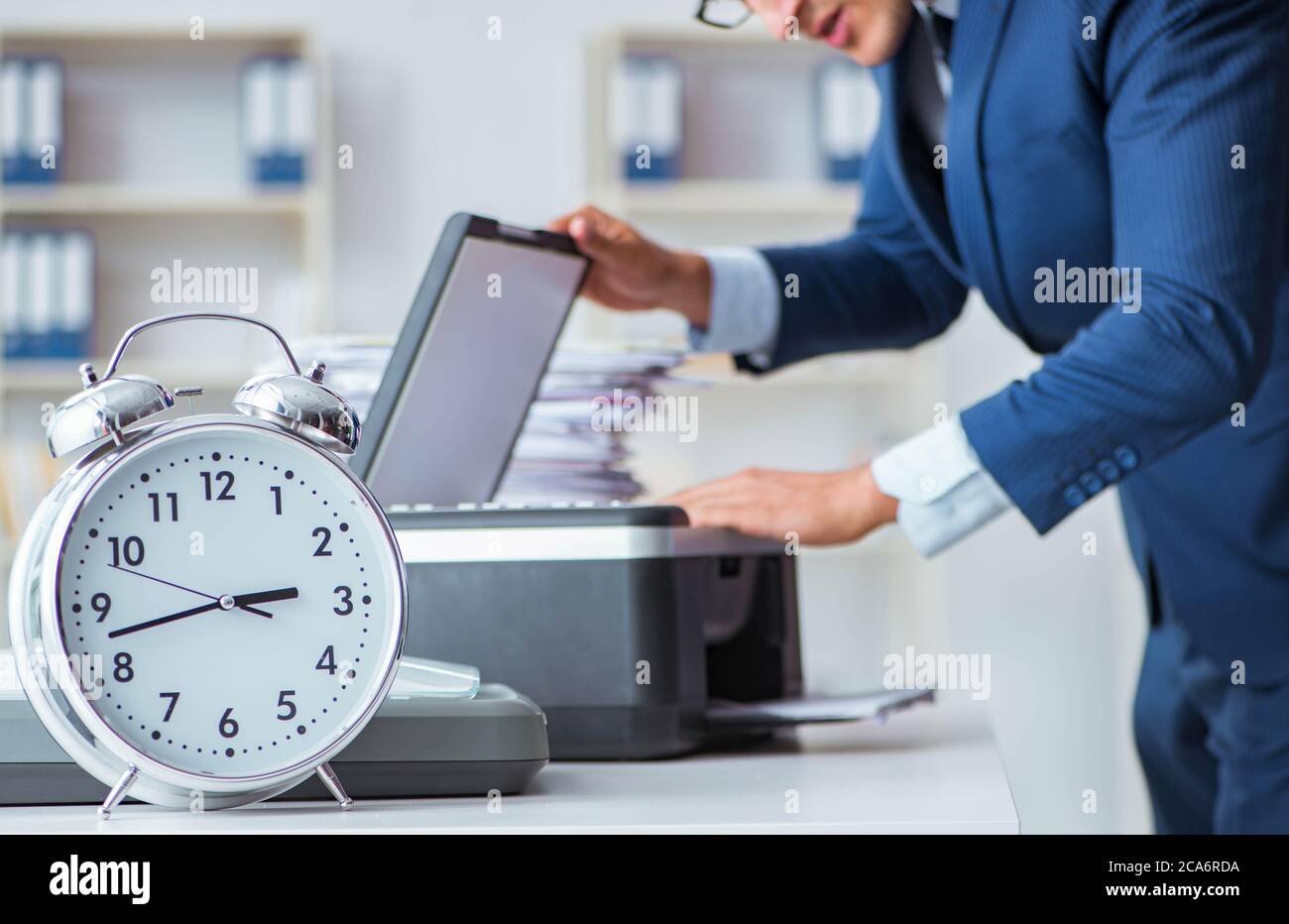 The businessman making copies in copying machine hi-res stock ...