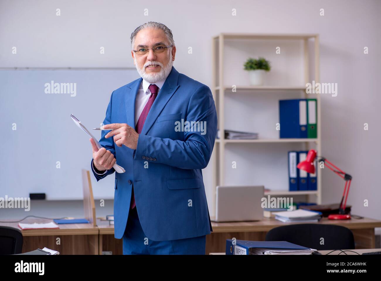 Cheerful male retiree in suit hi-res stock photography and images - Alamy
