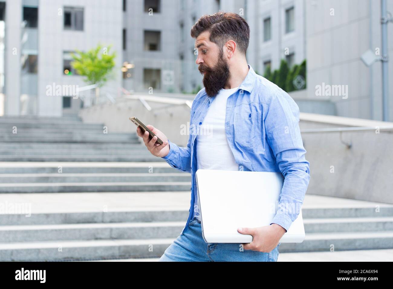 Guy going to work urban background. Modern technology. Work in social ...