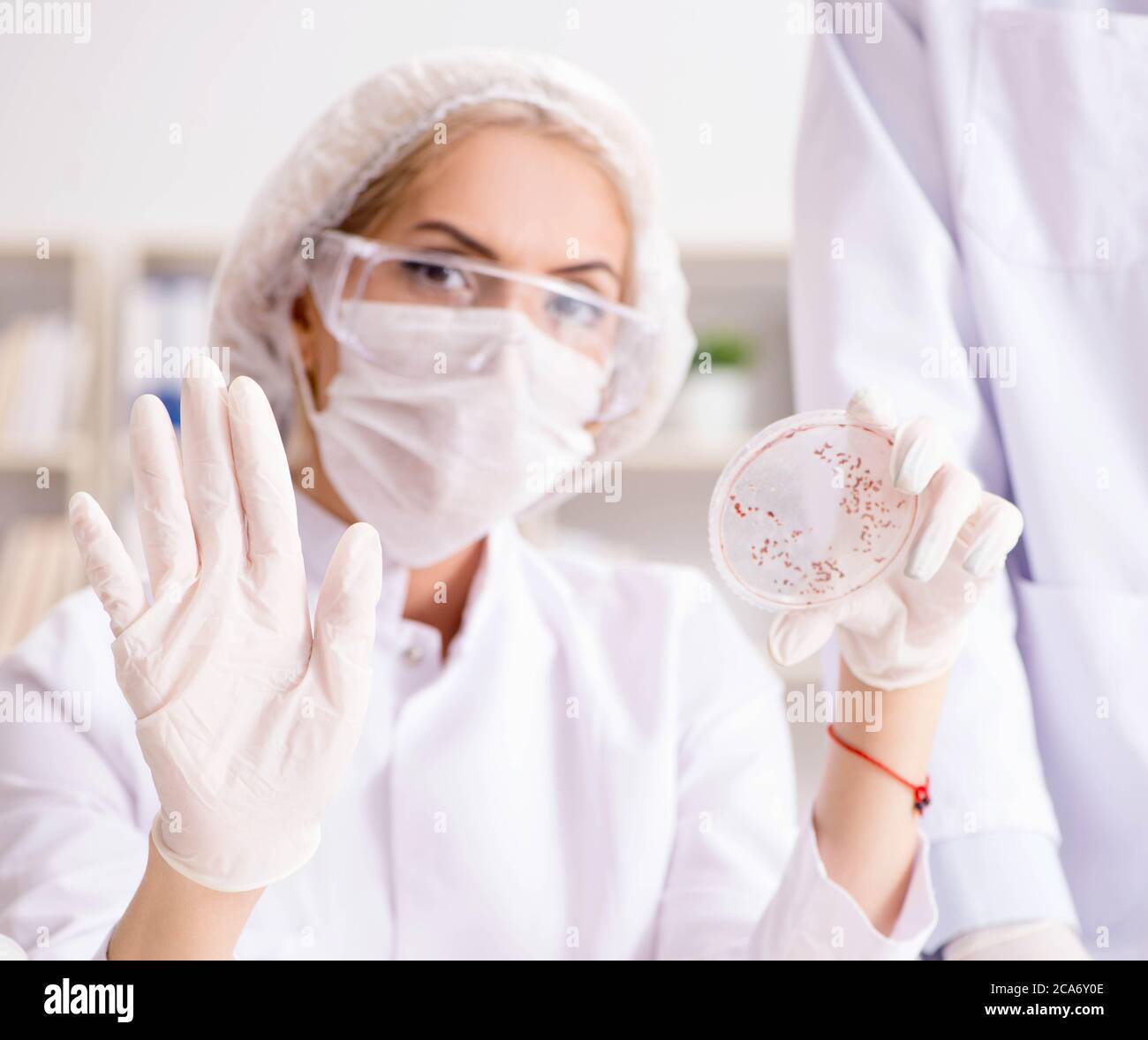 The young female woman doctor in hospital clinic lab Stock Photo - Alamy