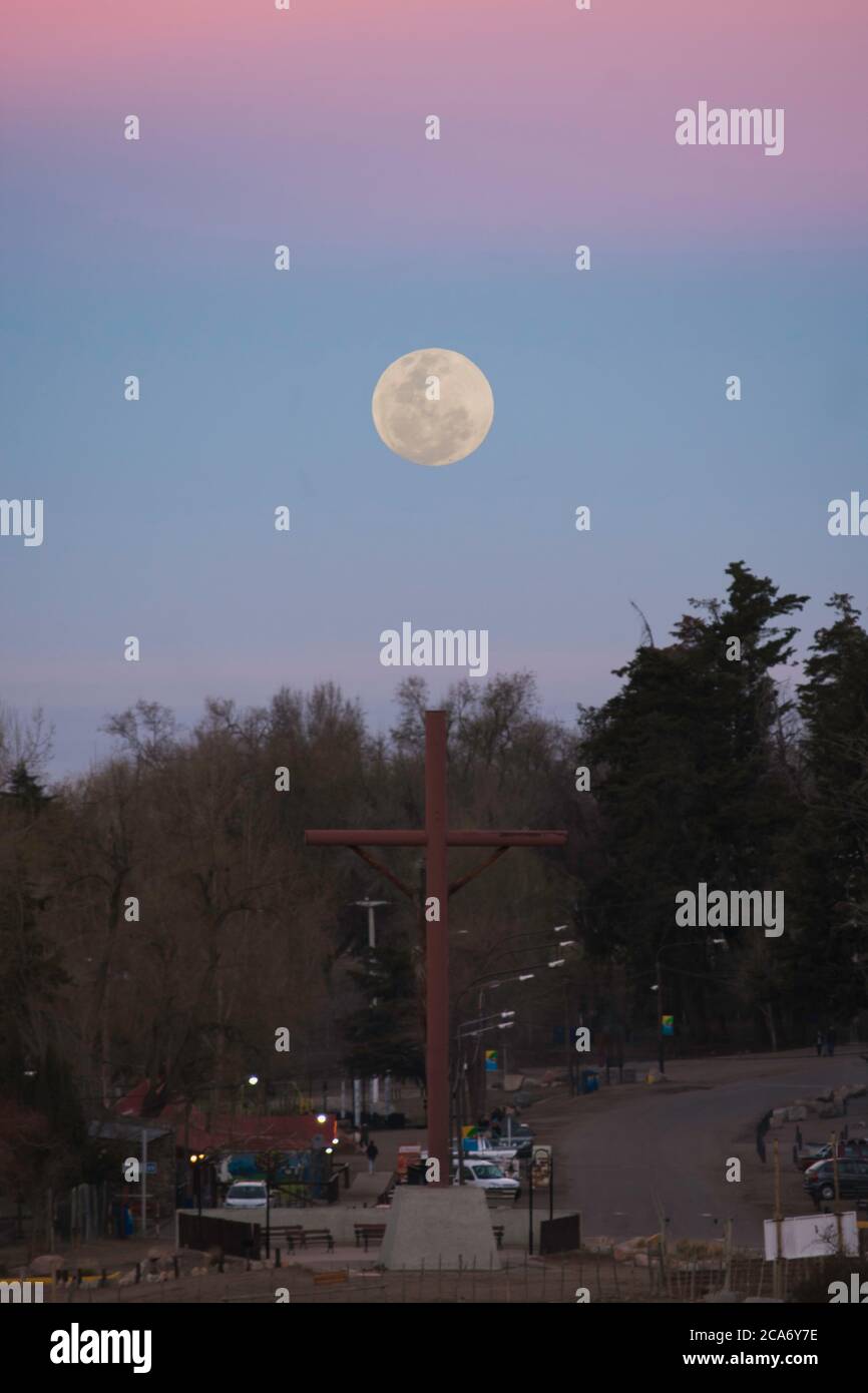 full moon over cross in rural site Stock Photo - Alamy