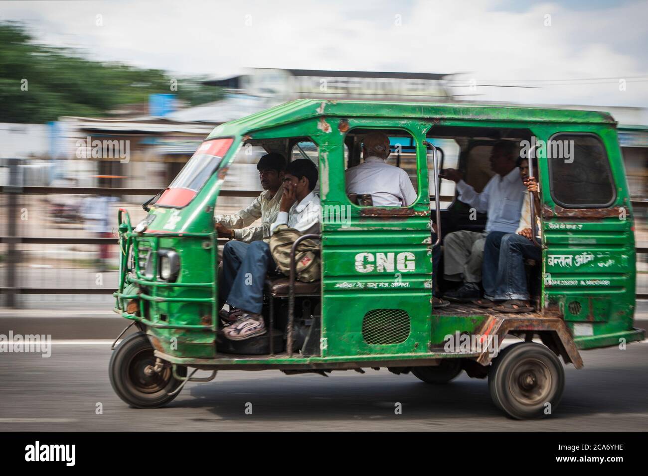 A common style of rickshaw on the streets of northern India Stock Photo ...