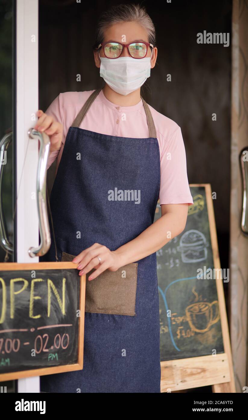 Small business back to open again during COVID-19 disease Stock Photo ...