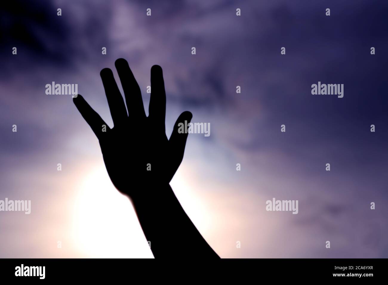 Hand reaching out to the sky Stock Photo - Alamy