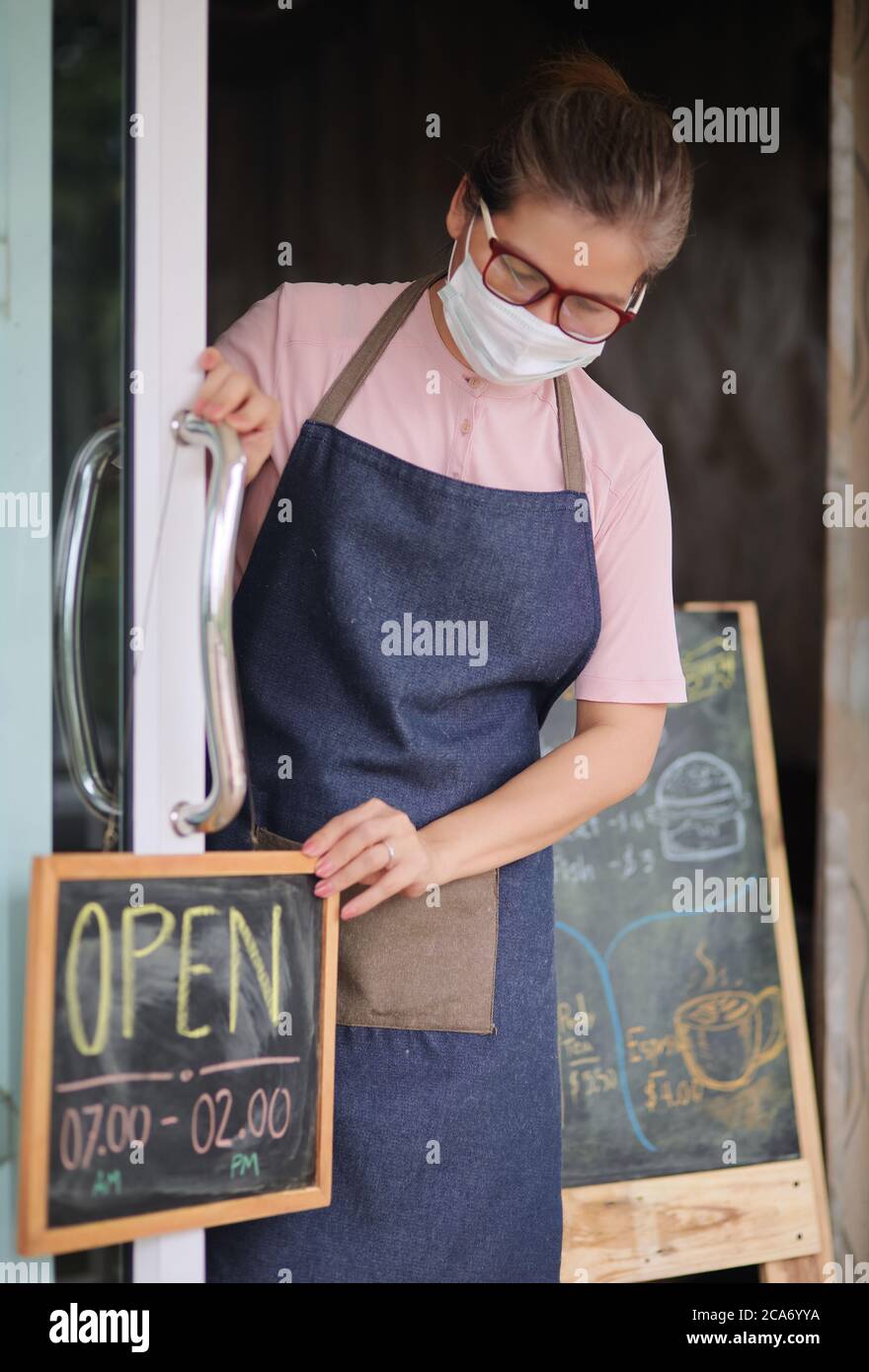 Small business back to open again during COVID-19 disease Stock Photo ...