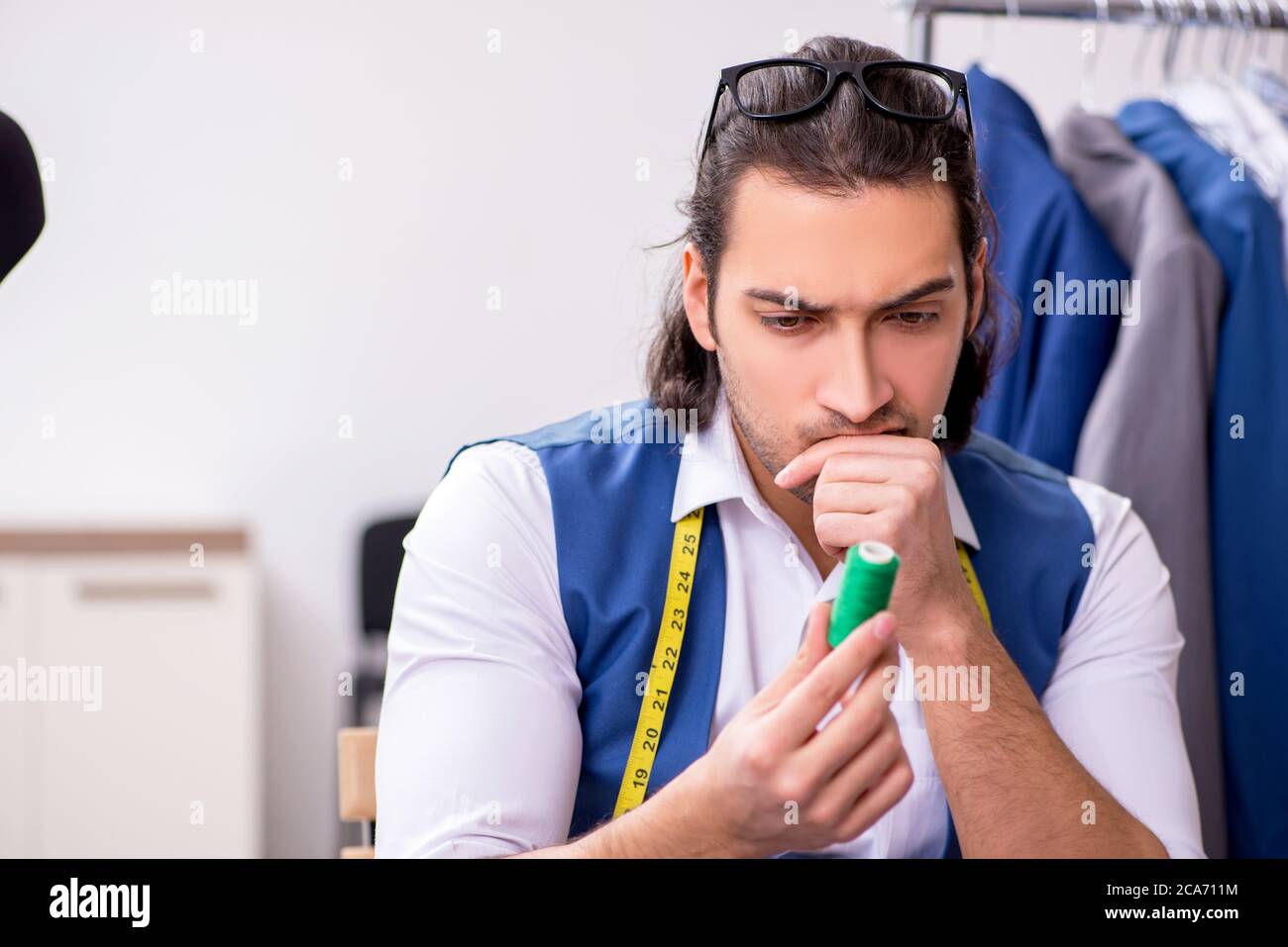 Bespoke tailoring male model hi-res stock photography and images - Alamy