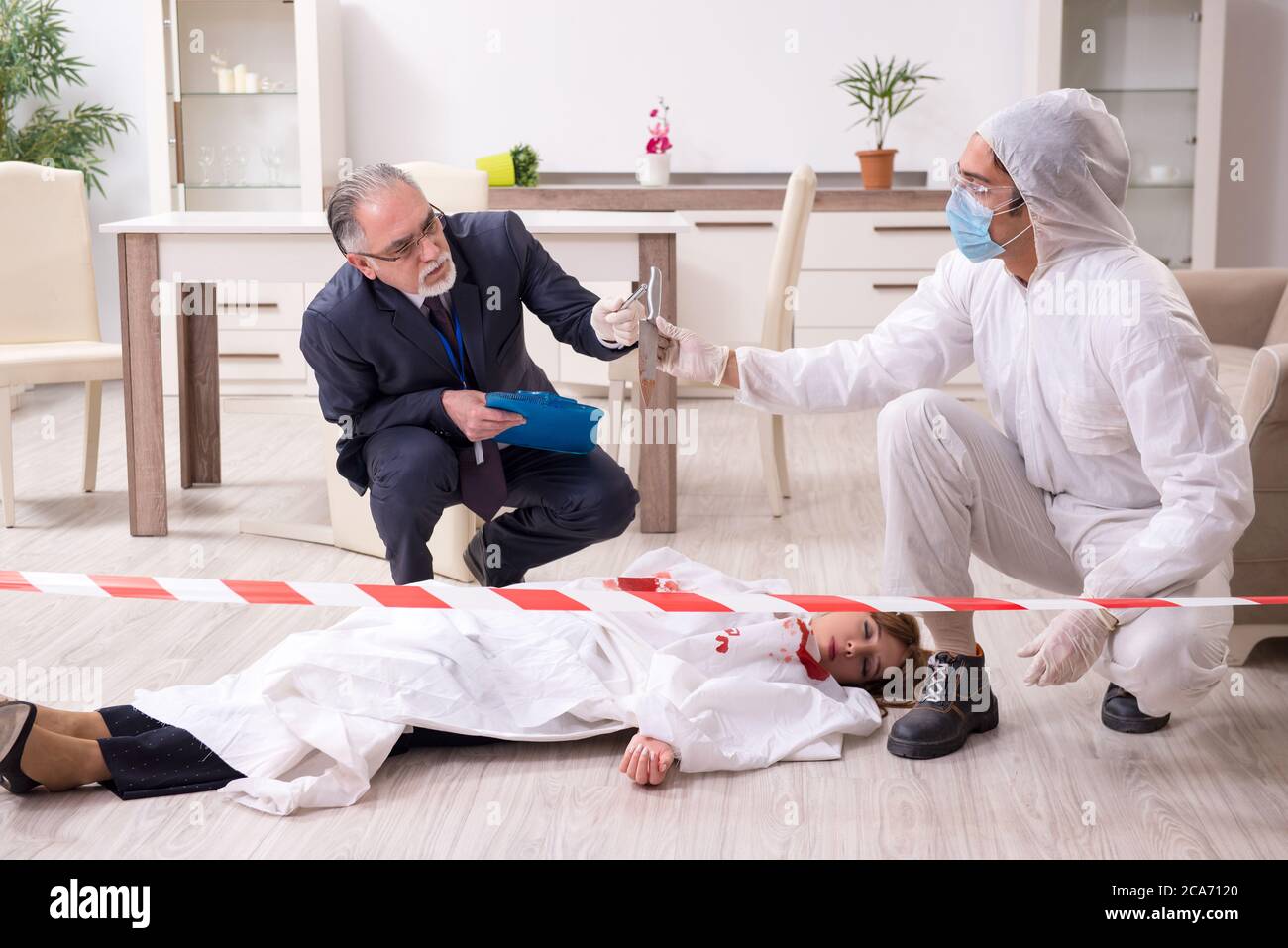 Forensic experts search hi-res stock photography and images - Alamy