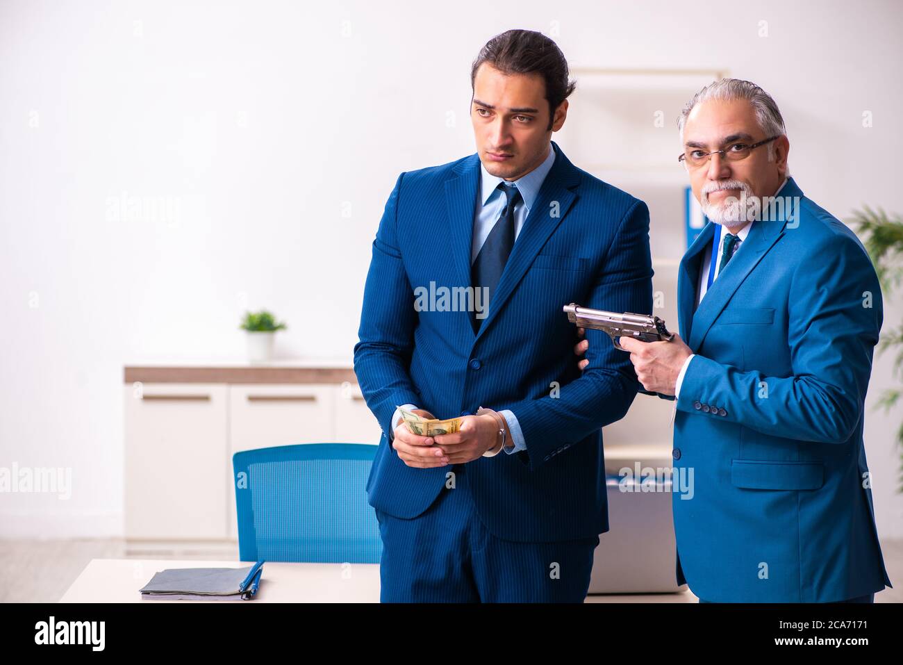 Police investigator searching suspect hi-res stock photography and ...