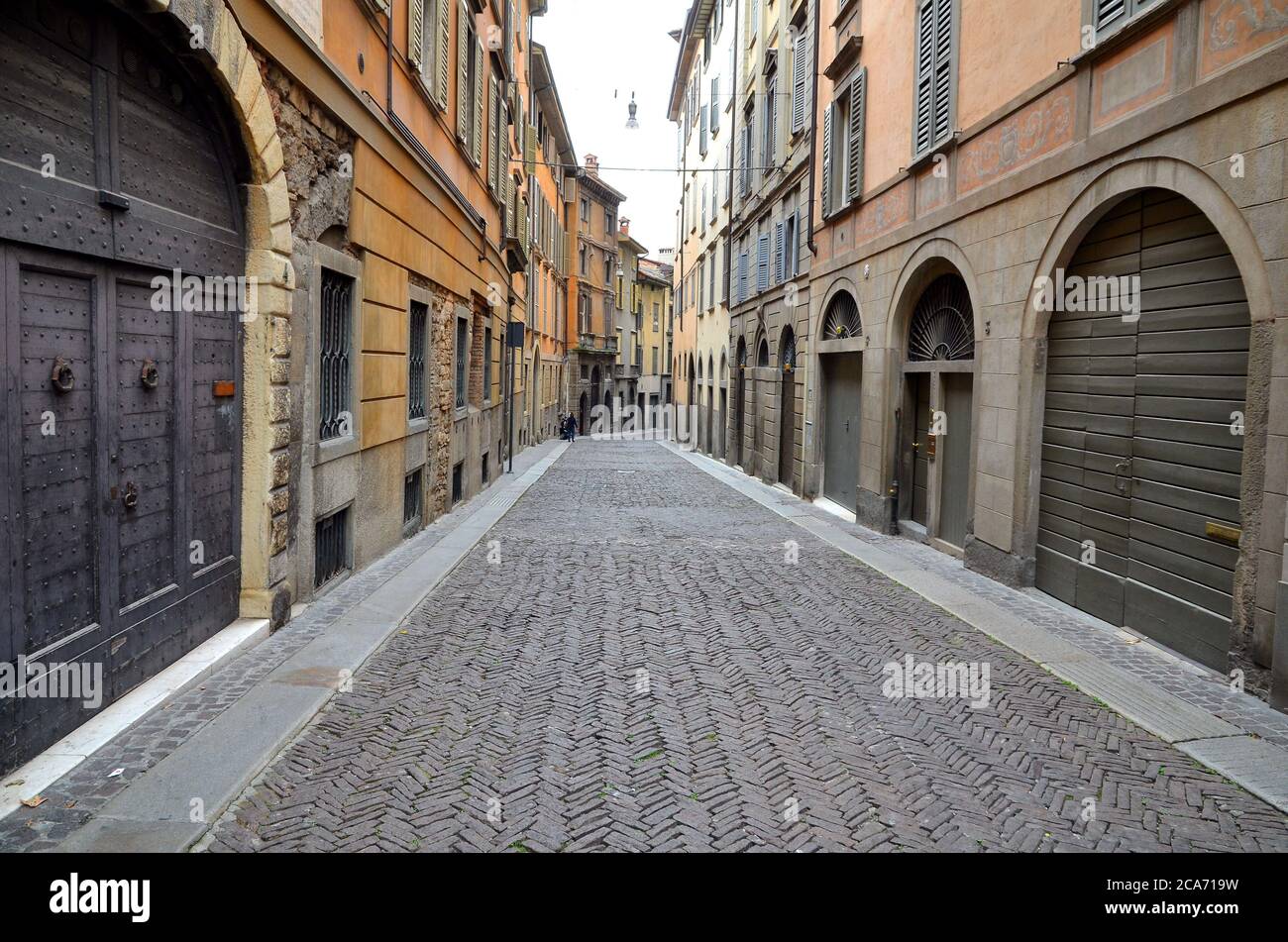 street with gate in old Ilaty Stock Photo - Alamy