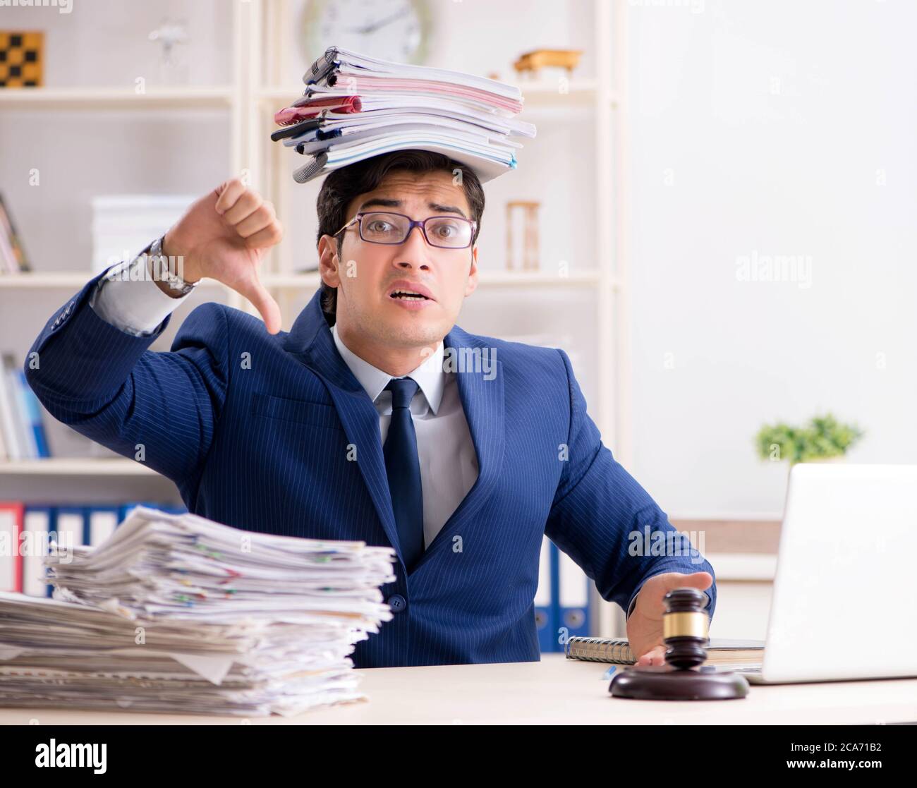 The young handsome judge working in court Stock Photo - Alamy