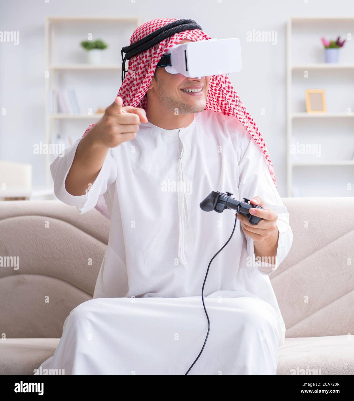 The arab man addicted to video games Stock Photo - Alamy