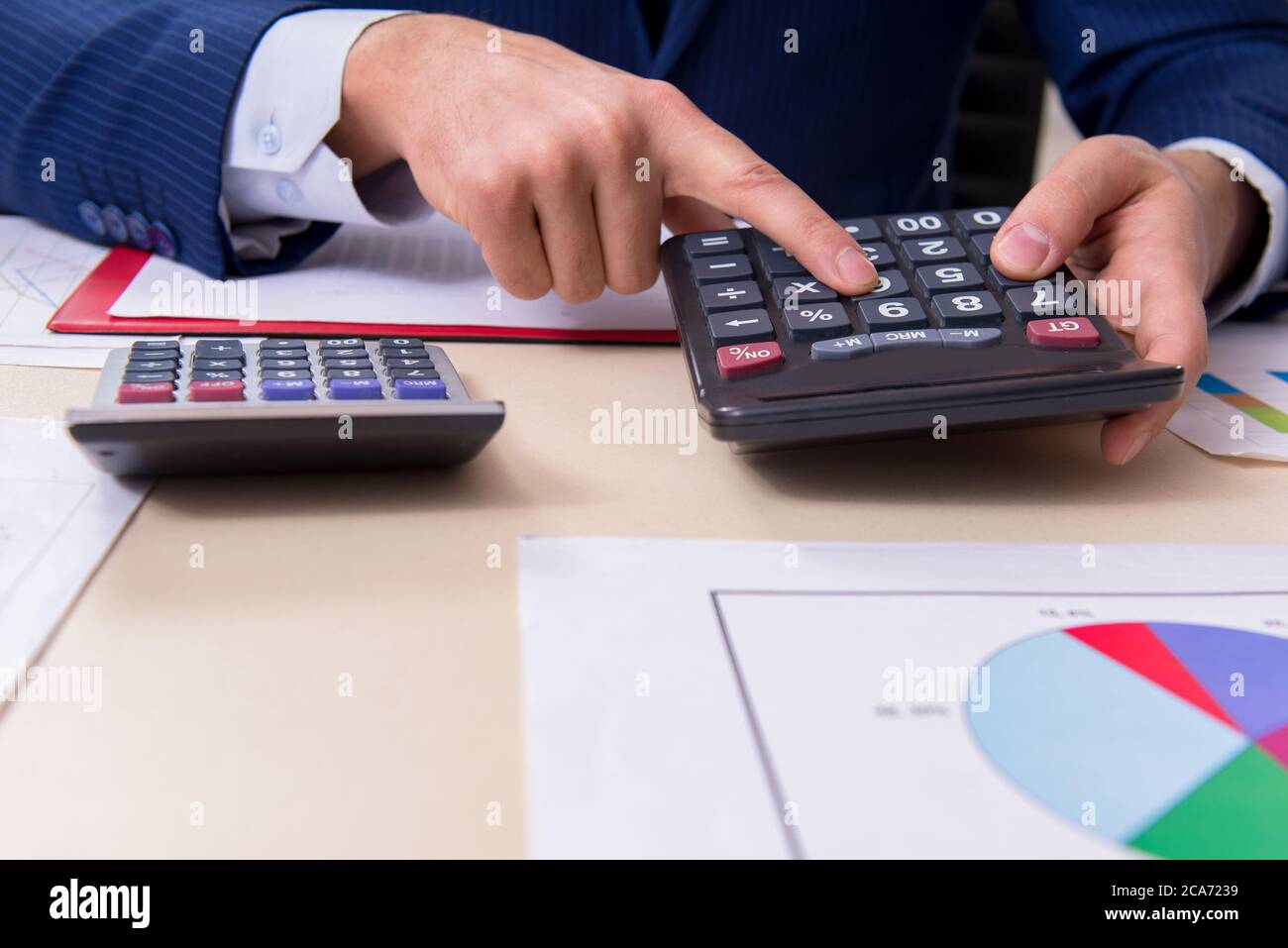 Young financial manager in the office Stock Photo - Alamy