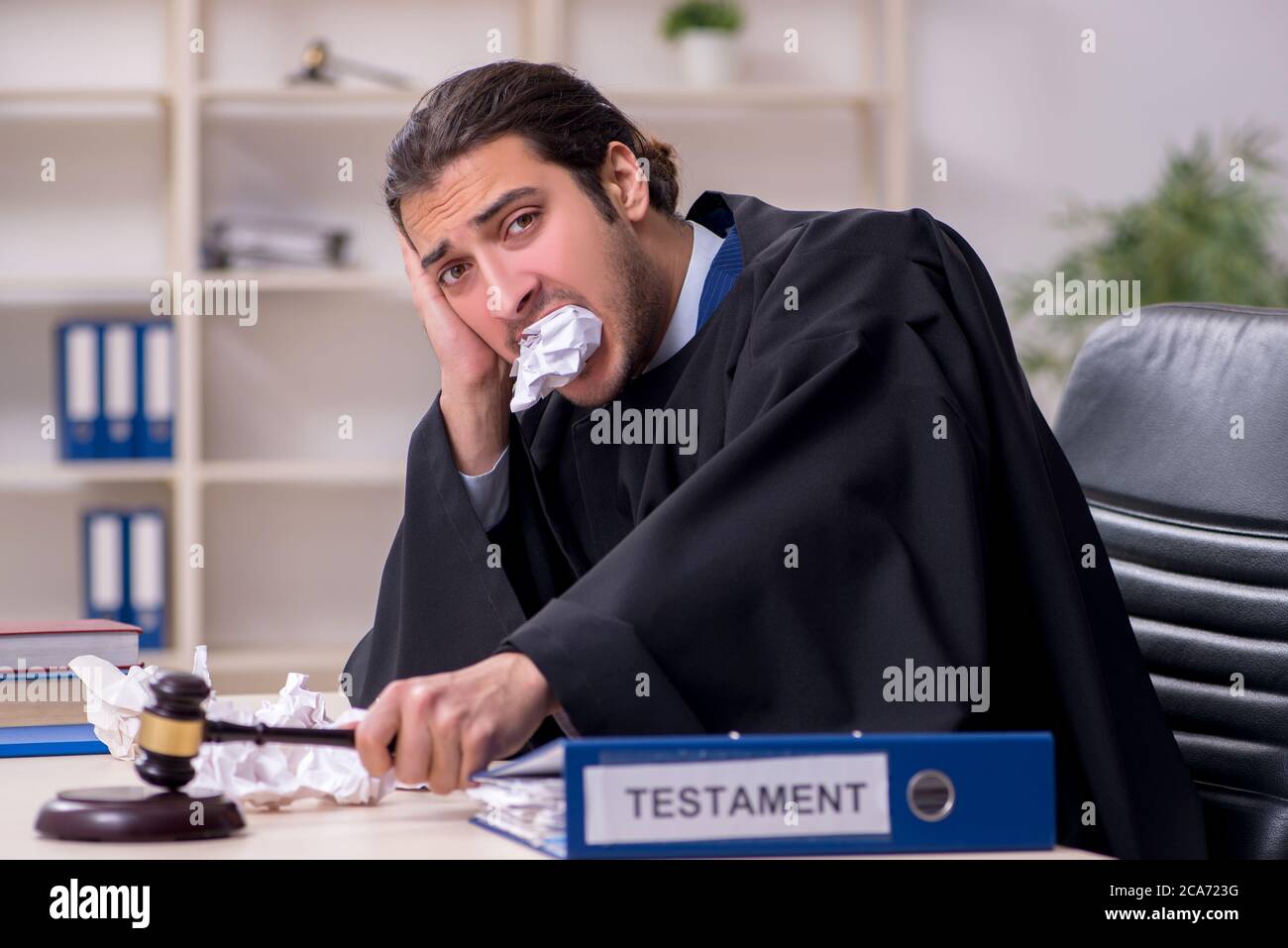 Young judge working in courthouse Stock Photo - Alamy