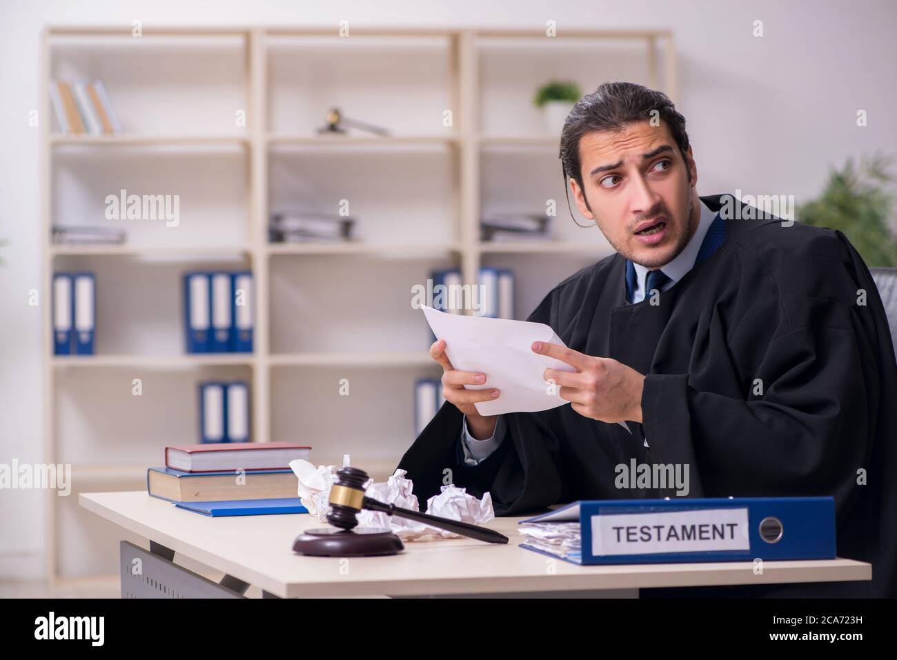 Young judge working in courthouse Stock Photo - Alamy