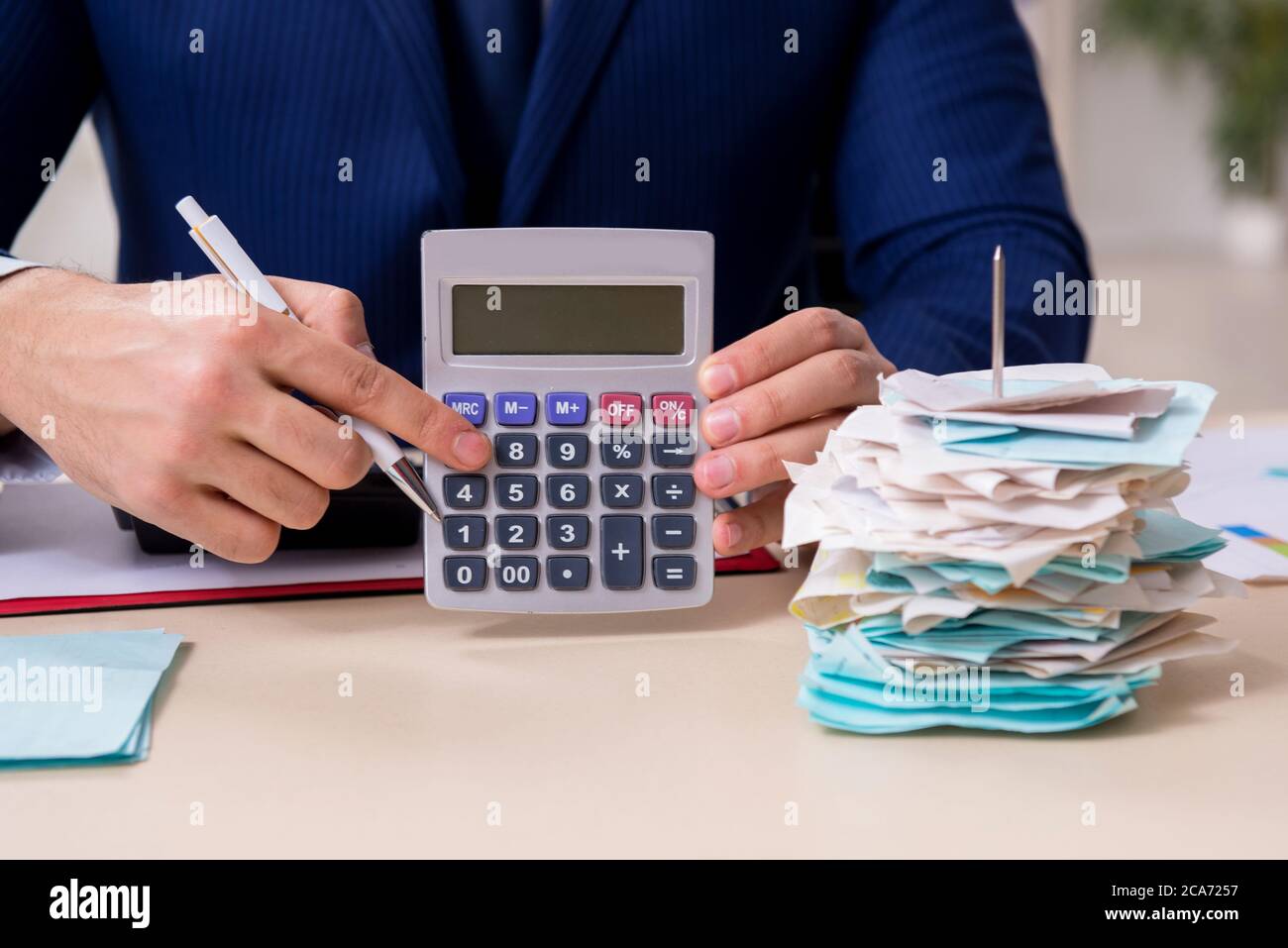Young financial manager in the office Stock Photo - Alamy