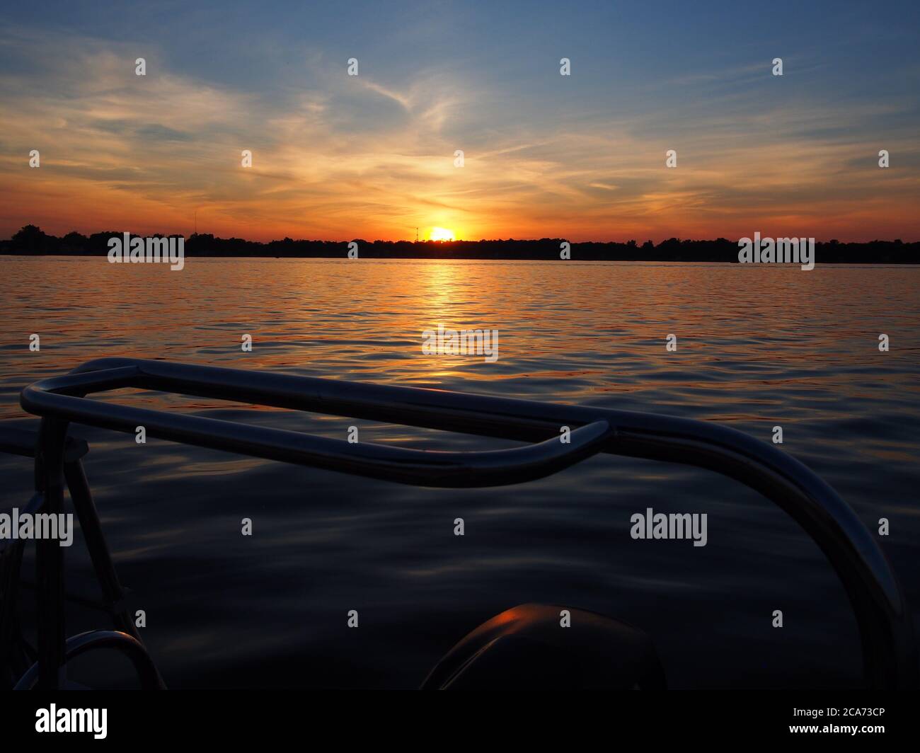 Lake Sunset Reflecting on Pontoon Boat Stock Photo - Alamy