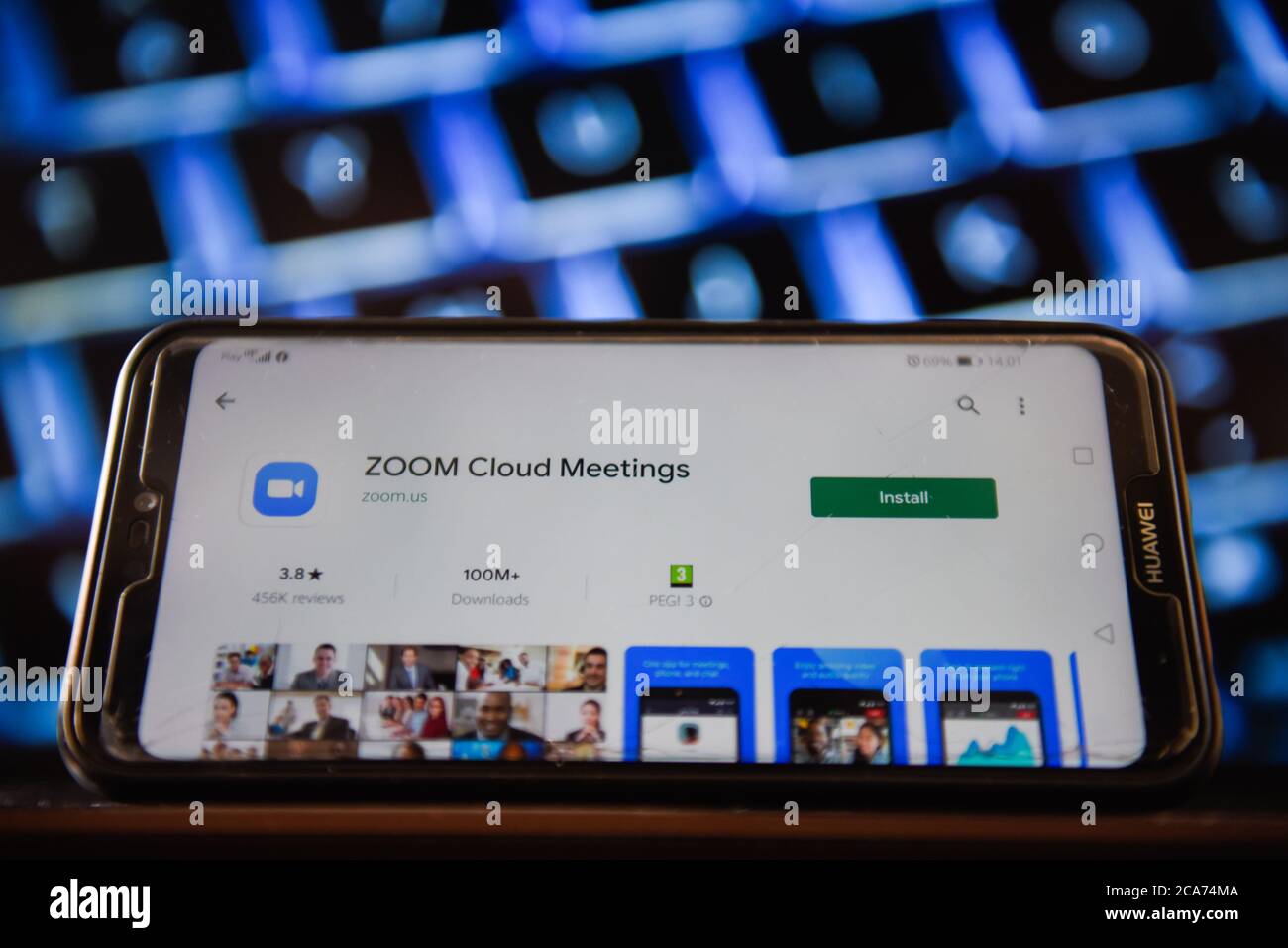 In this photo illustration, a Zoom logo is displayed on a smartphone ...