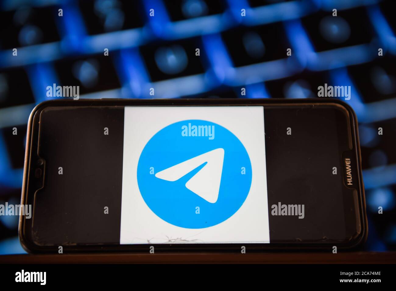 In this photo illustration, a Telegram logo is displayed on a ...