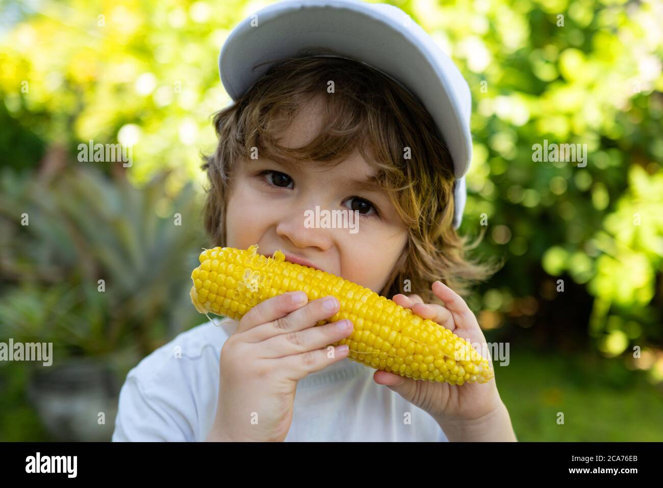 Boy growing corn hi-res stock photography and images - Alamy