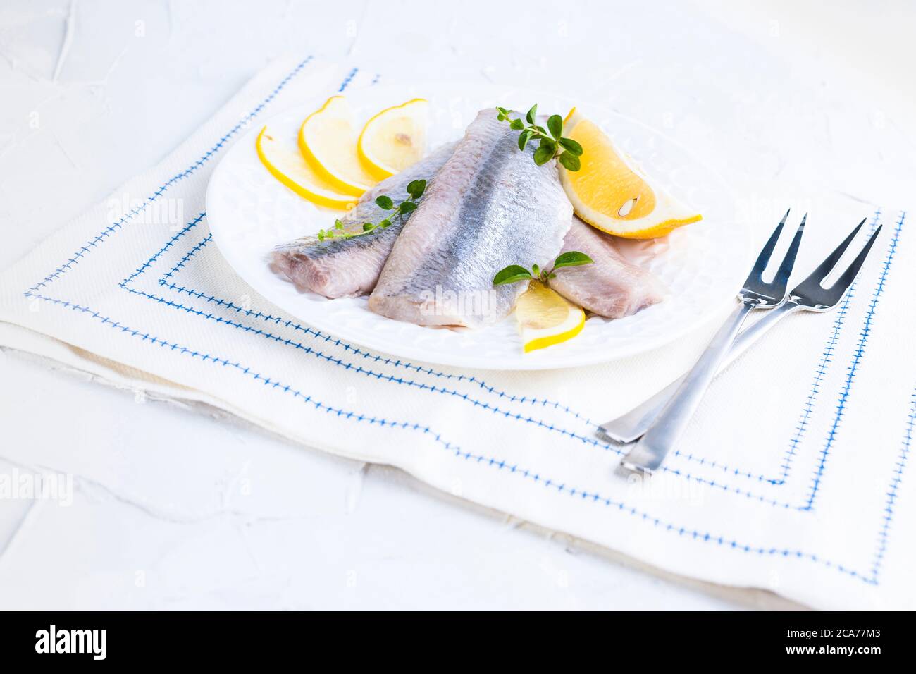 Dutch herring. Traditional Dutch food, marinated fish fillet with onion ...