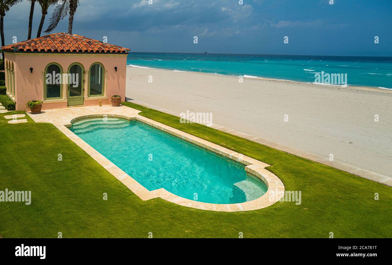 Beach house on sea with swimming pool and view in retro vintage design ...