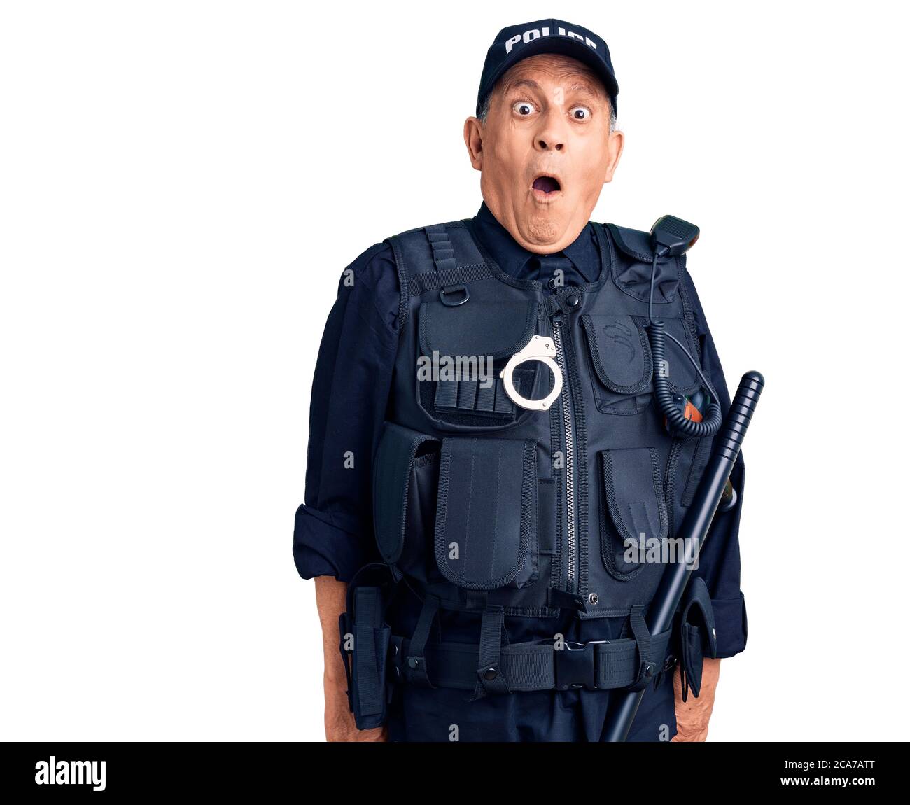 Senior handsome man wearing police uniform scared and amazed with open ...