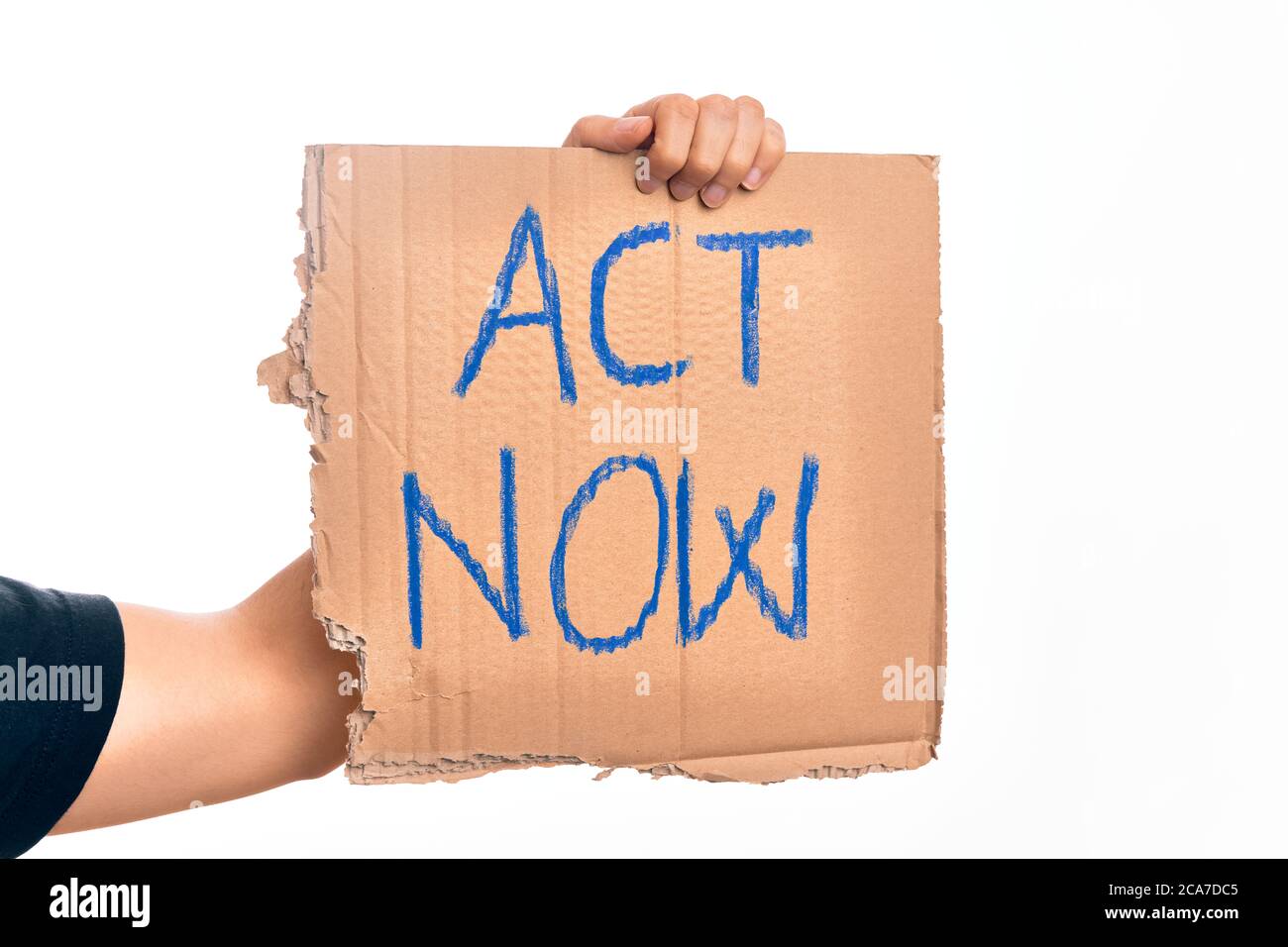 Cardboard banner ACT NOW text, take action now message over isolated ...
