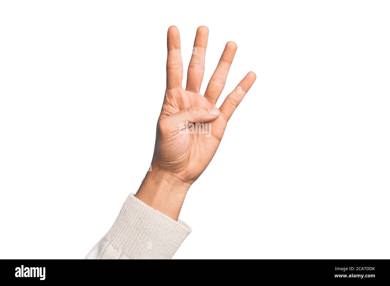 Hand of caucasian young man showing fingers over isolated white background counting number 4 ...